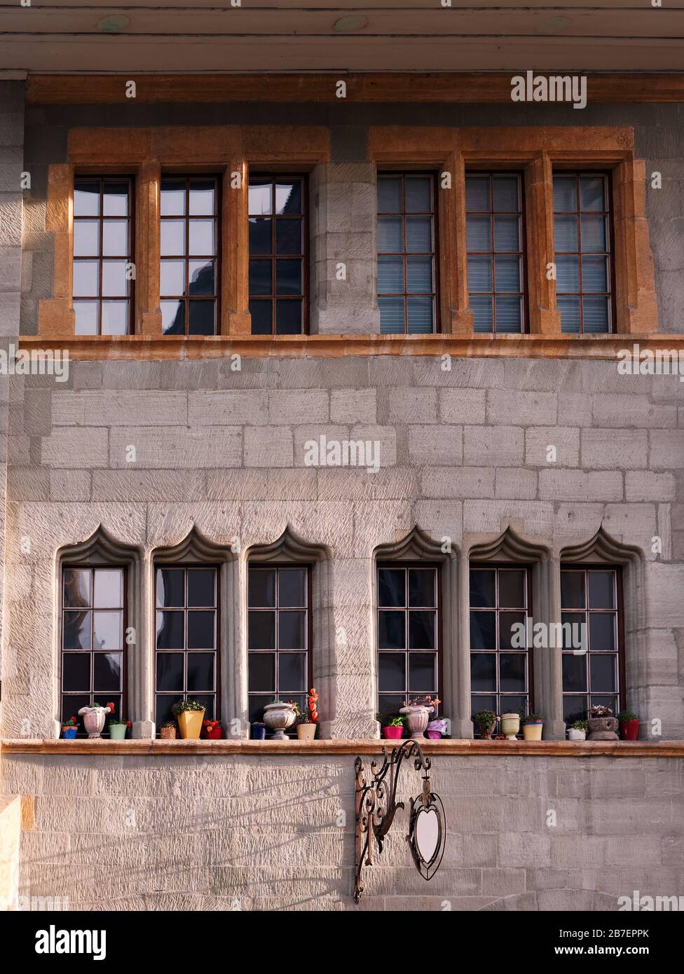 Brick wall windows flower hi-res stock photography and images - Alamy
