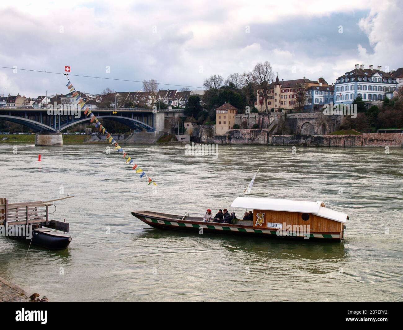 Basel, Switzerland - 2017, December 17: Rope ferry on the Rhine river ...