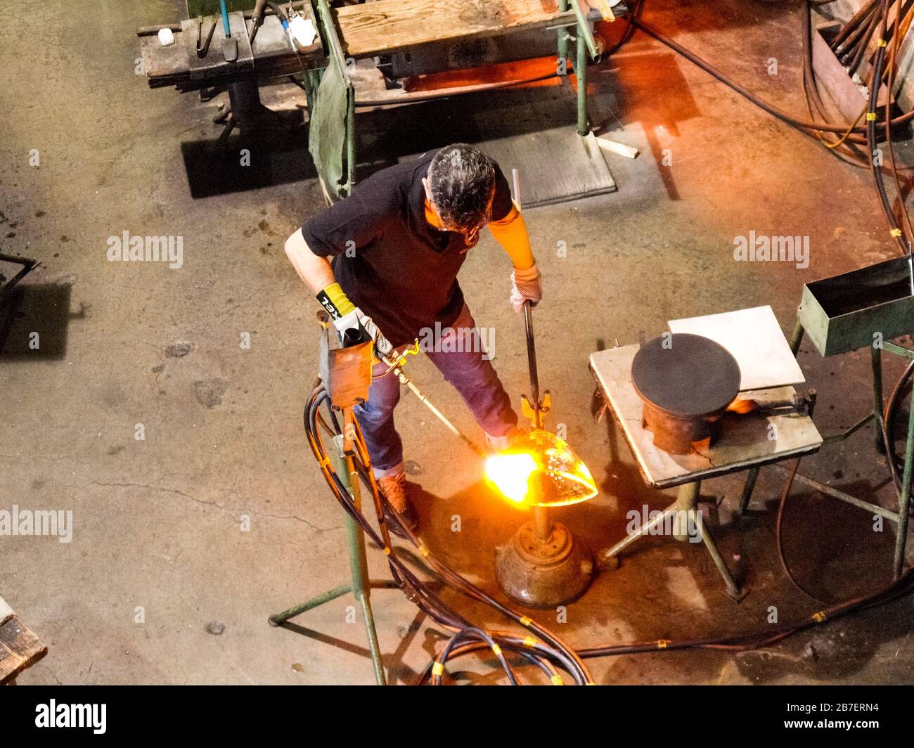 Male worker creating glass in hi-res stock photography and images - Alamy