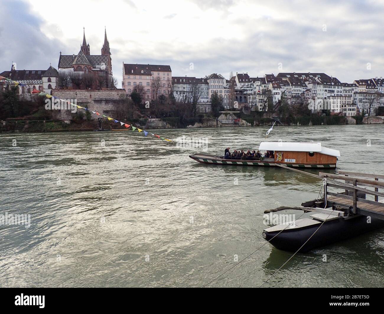 Basel, Switzerland - 2017, December 17: Rope ferry on the Rhine river ...