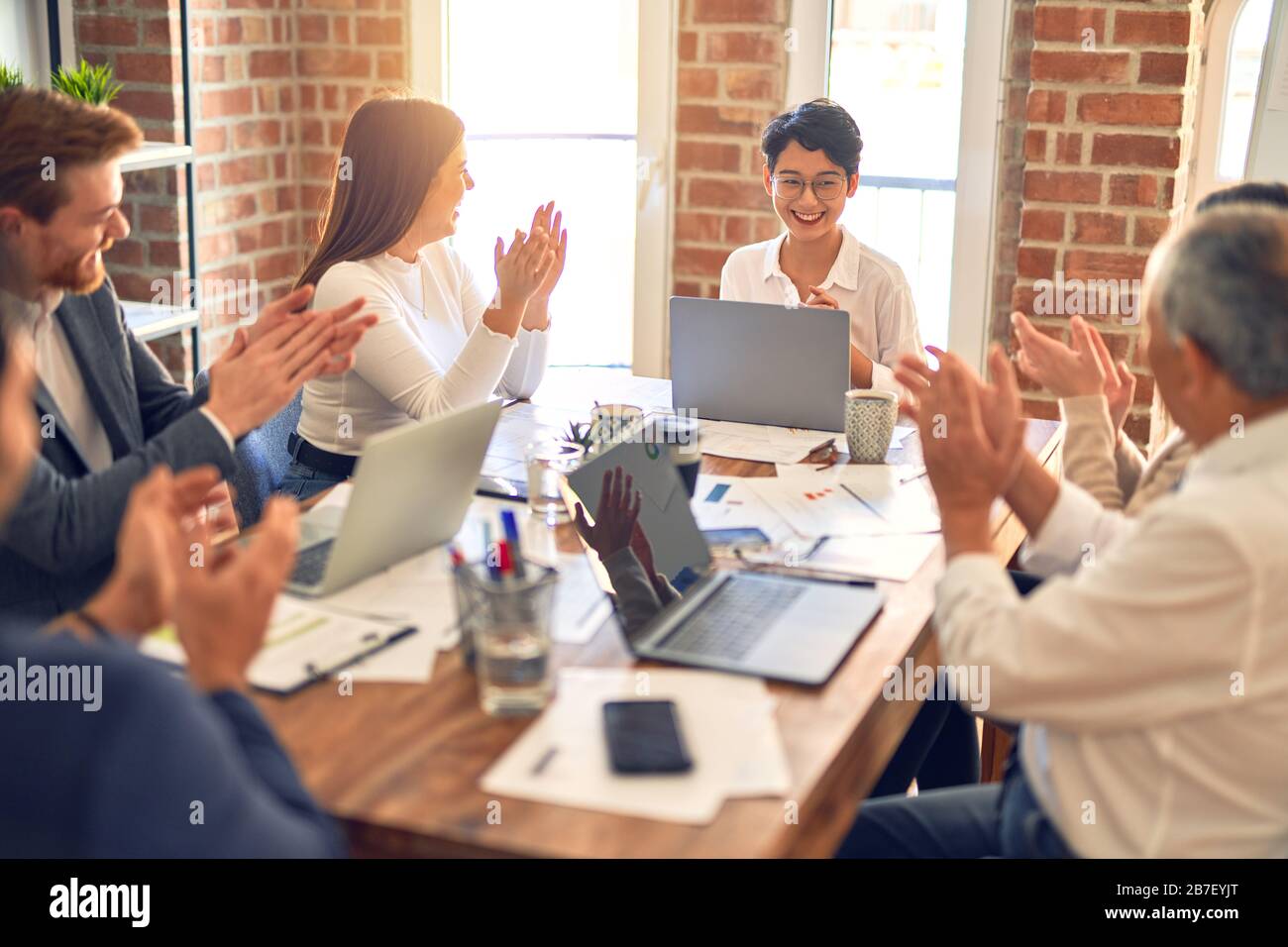 Group of business workers smiling happy and confident. Working together ...