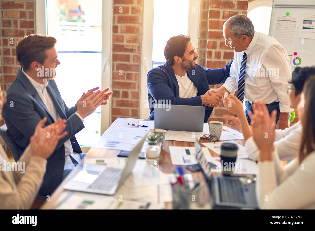 Group of business workers smiling happy and confident. Working together ...