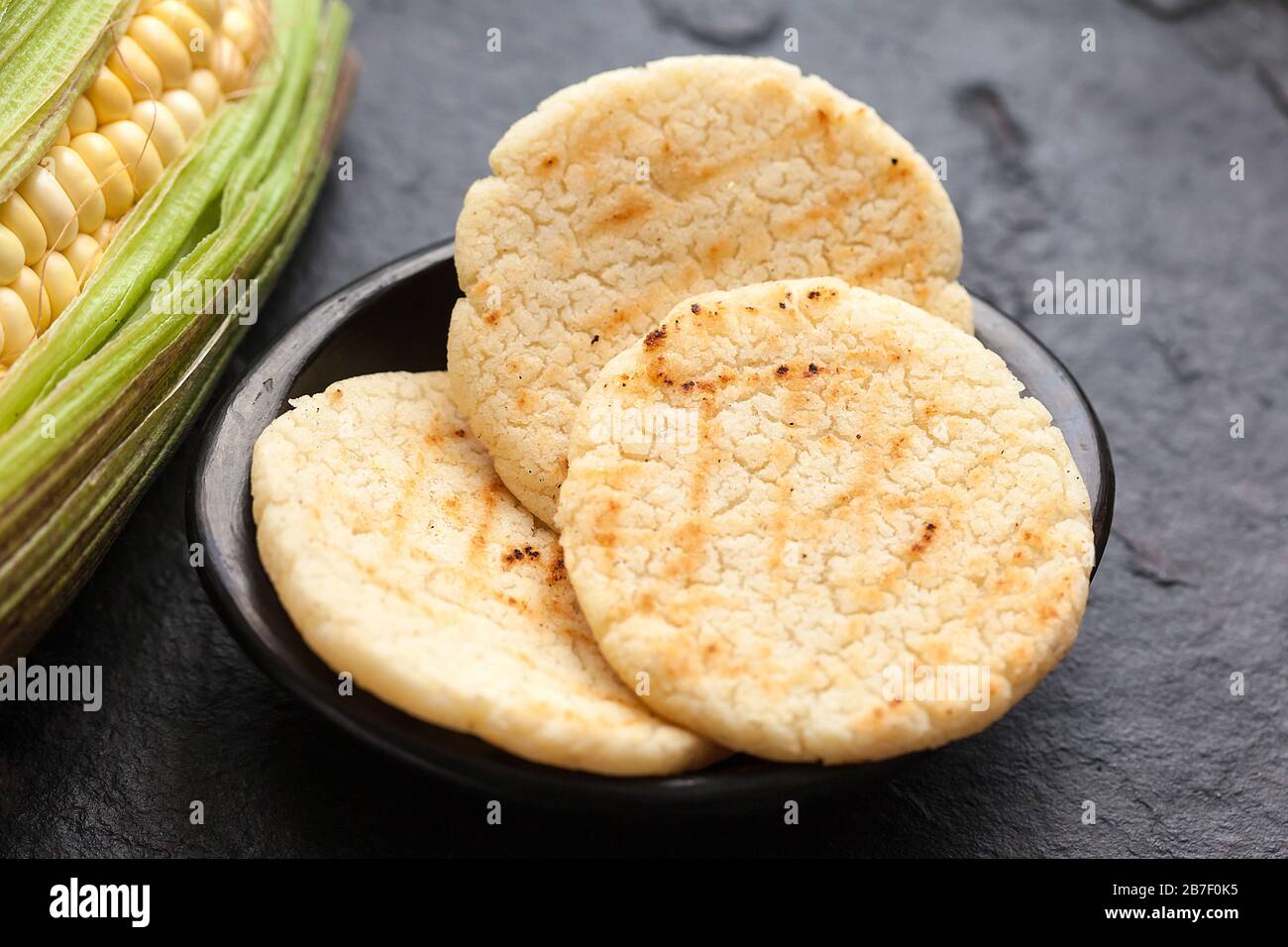 Roasted traditional South American corn arepa Stock Photo - Alamy