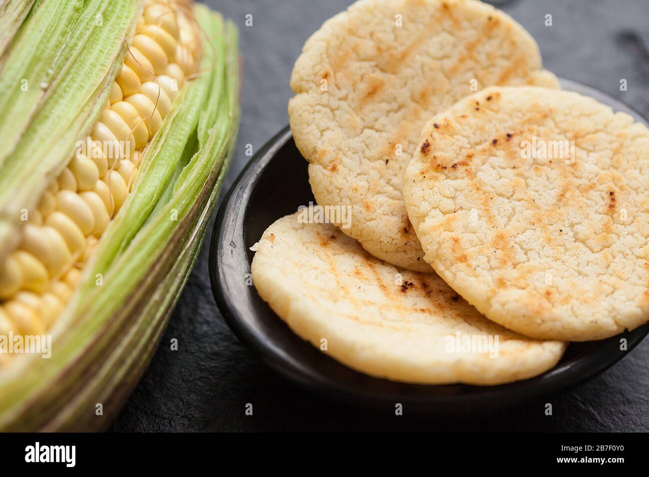 Roasted traditional South American corn arepa Stock Photo - Alamy