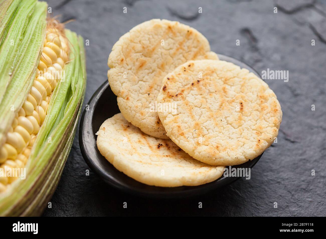 Roasted traditional South American corn arepa Stock Photo - Alamy