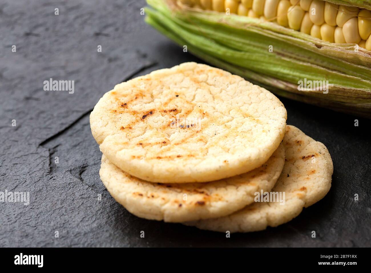 Roasted traditional South American corn arepa Stock Photo - Alamy