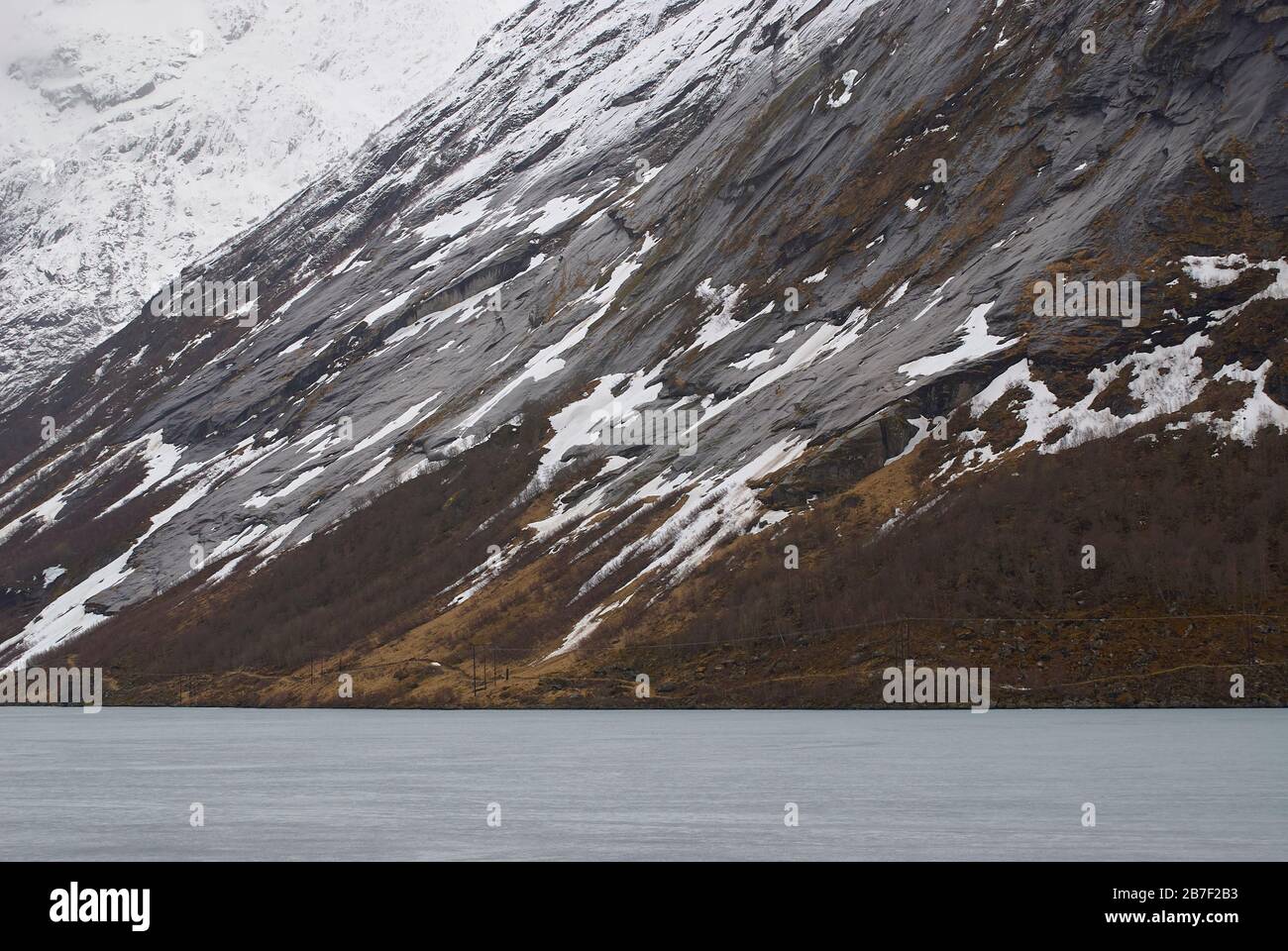 Steep granite fjordwall at Kjøsnesfjord, Norway Stock Photo - Alamy
