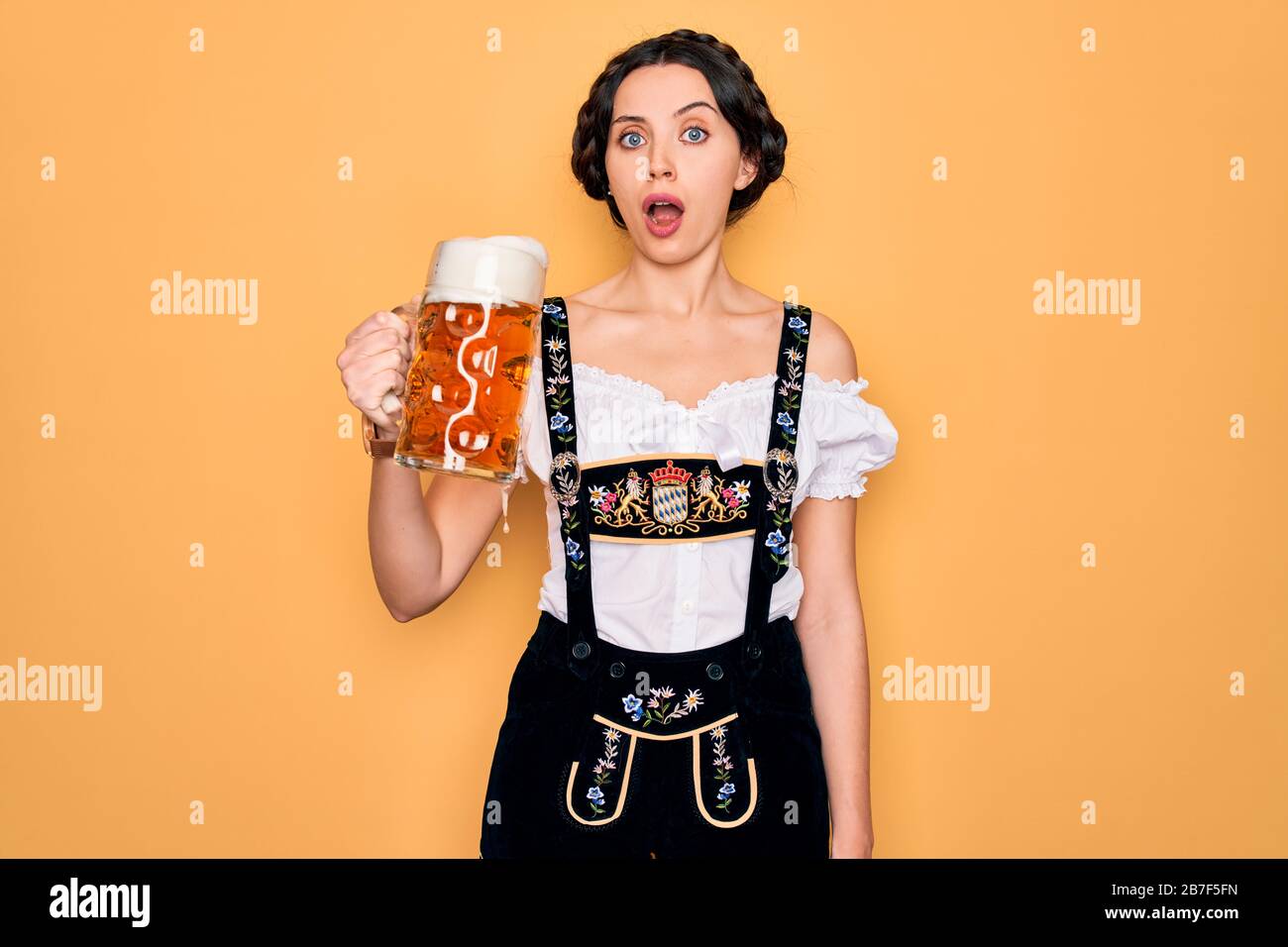 Beautiful german woman with blue eyes wearing traditional octoberfest ...