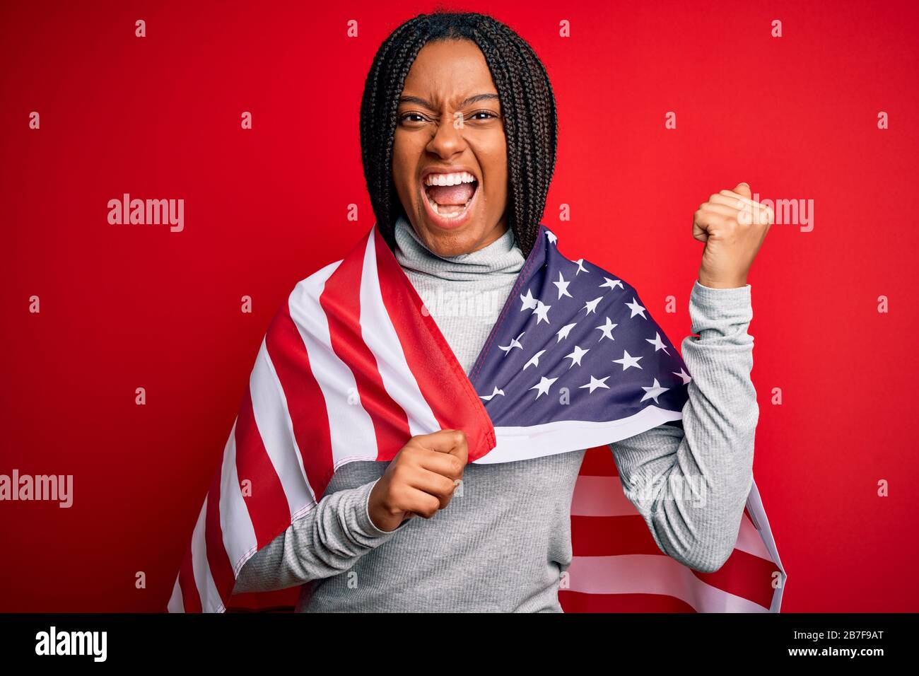 Young african american patriotic woman wearing united states of america ...