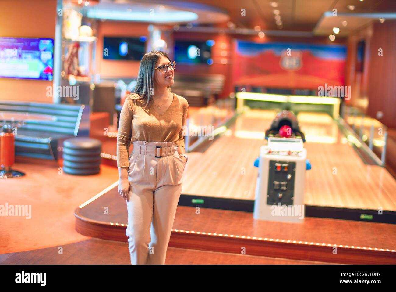 Young beautiful woman smiling happy and confident. Standing with smile ...