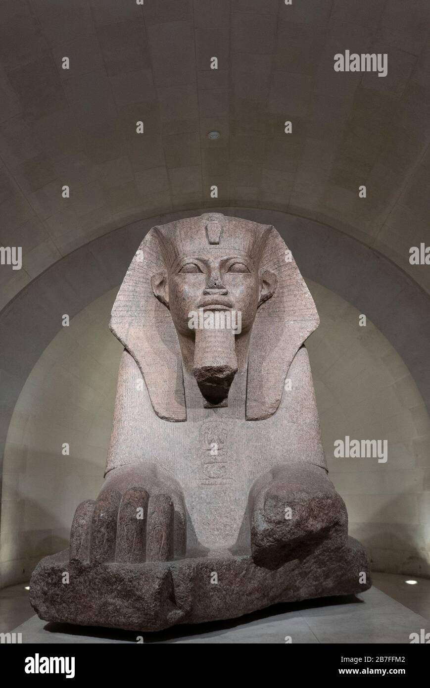 The Great Sphinx of Tanis granite sculpture at the Louvre Museum in ...