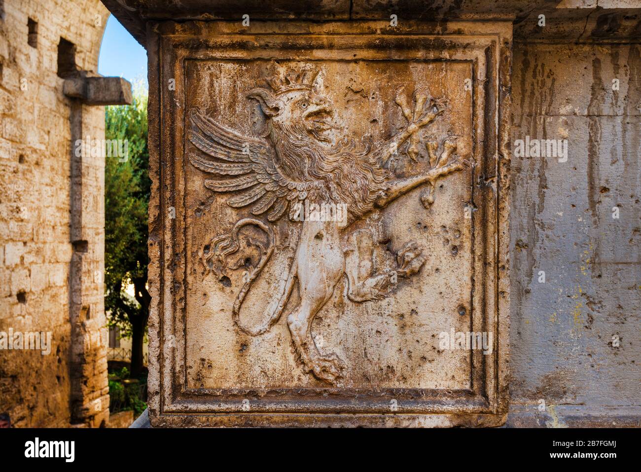Griffon symbol of Perugia in Umbria on medieval Gate of St Luke in the ...