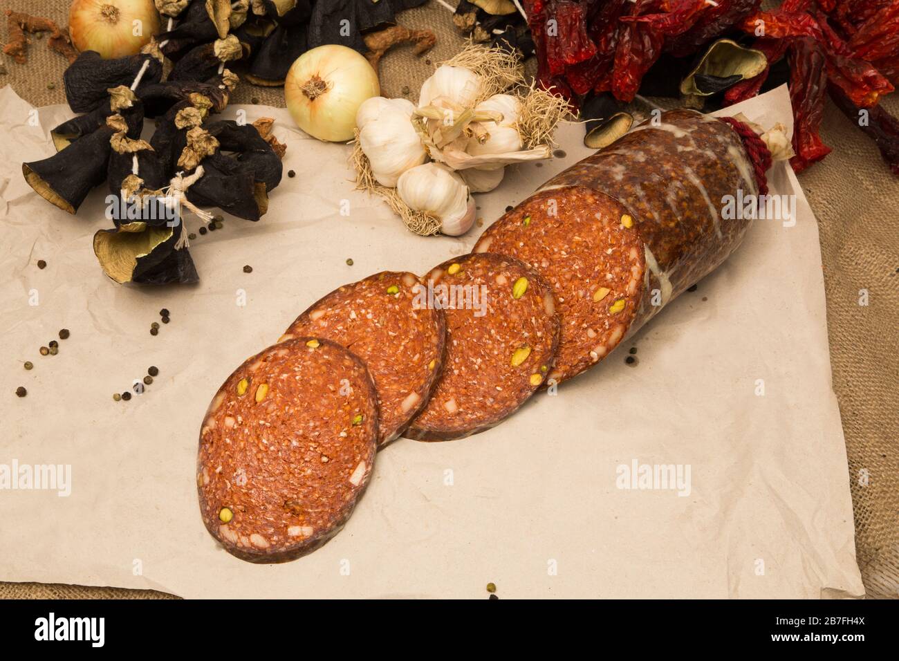 Turkish sausage golden sucuk. Sujuk (sucuk), a dry spicy sausage on ...