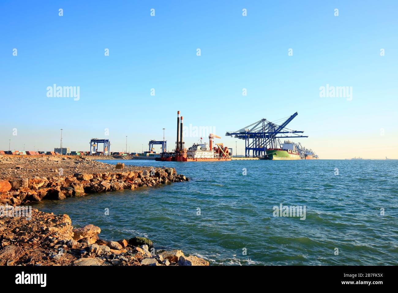 The container terminal is by the sea Stock Photo - Alamy