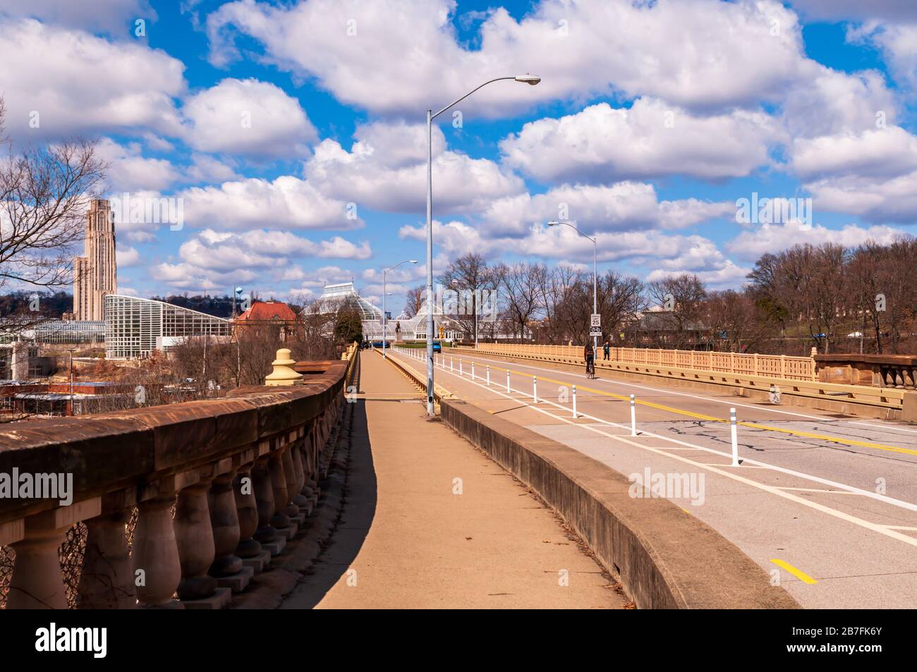 The Panther Hollow bridge with Phipps Conservatory and the Cathedral of ...