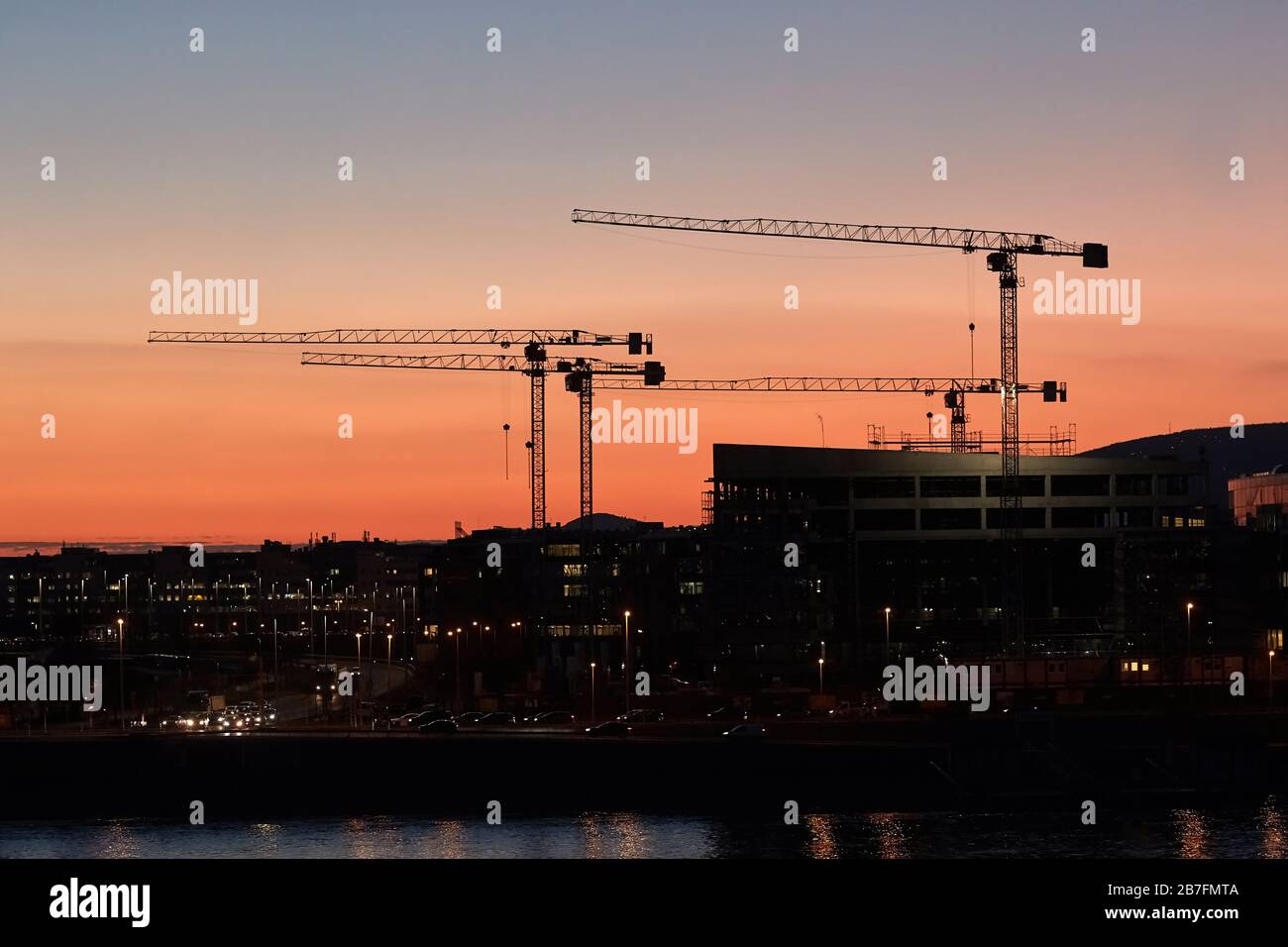 Tall Construction Cranes Stock Photo - Alamy