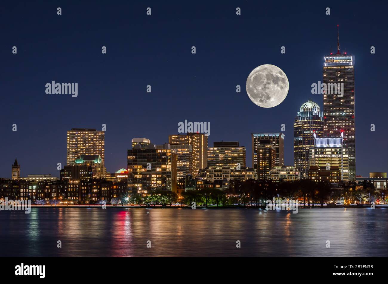 City skyline at sunset with supermoon hi-res stock photography and ...