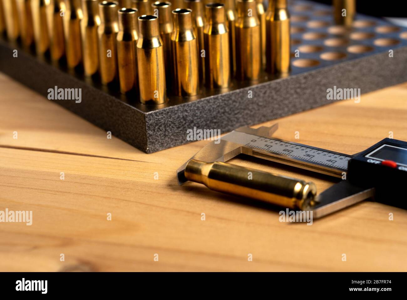 Production of cartridges for a rifle, reload. Measurement of the empty ...
