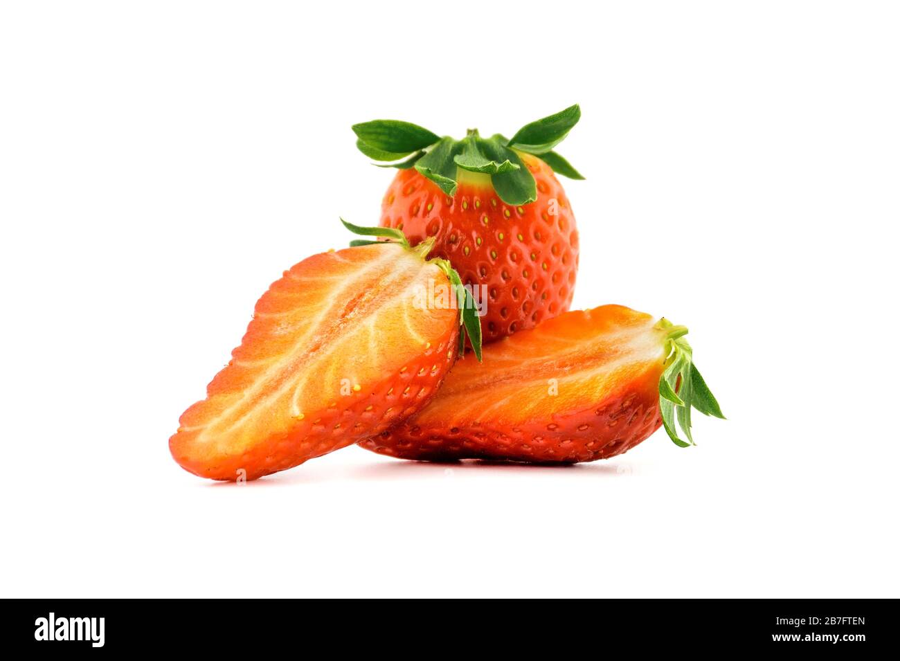 Whole strawberry fruit and half isolated on white background Stock ... Whole strawberry fruit and half isolated on white background Stock ...
