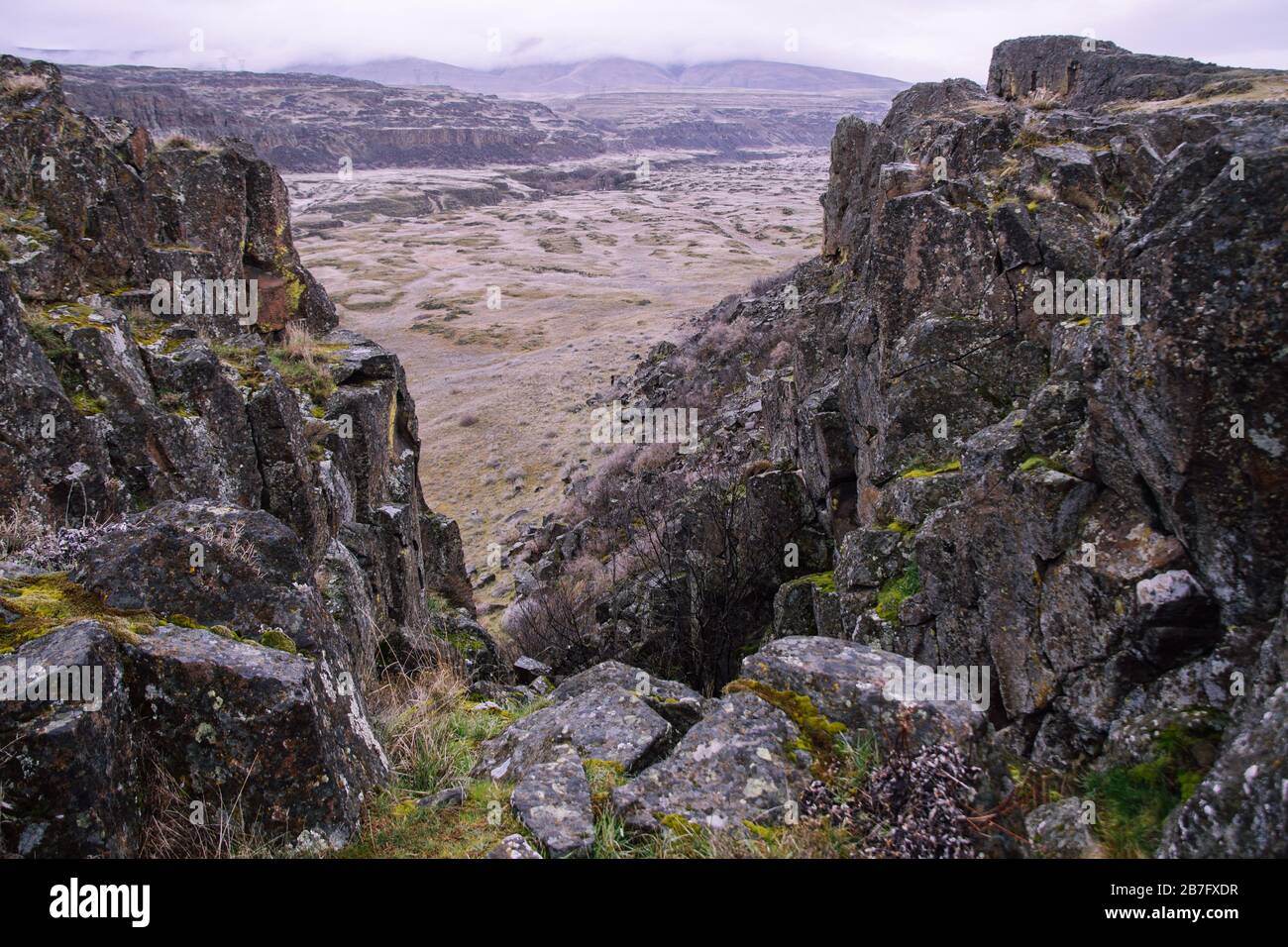 Large cliffs covered in grass and moss during daytime Stock Photo - Alamy