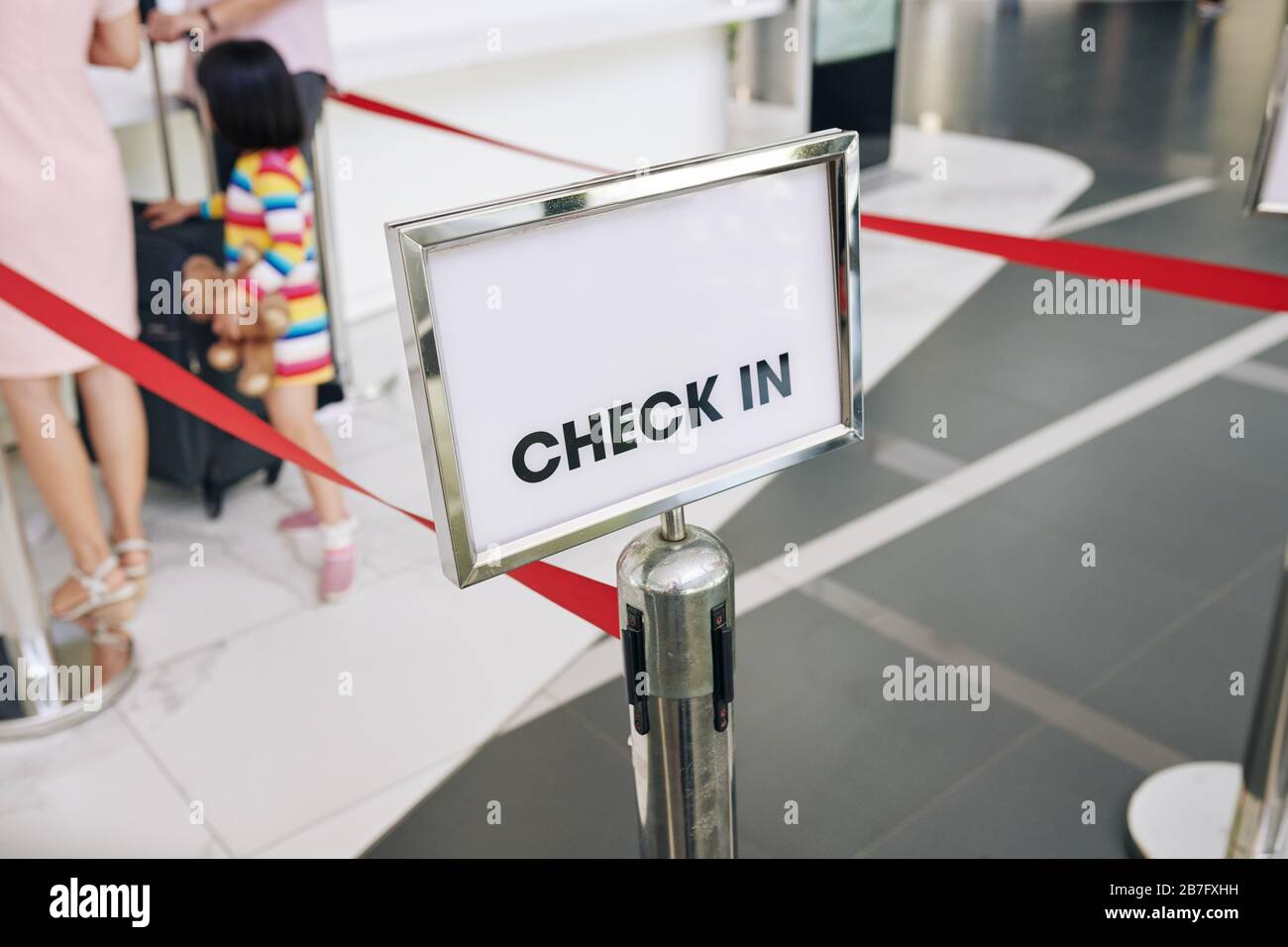 Board with inscription at check in line at reception of spa hotel Stock ...
