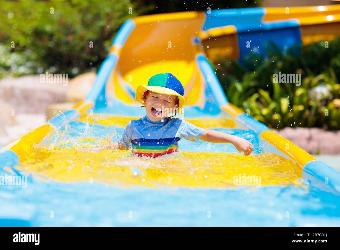 Girl slide slides splash hi-res stock photography and images - Alamy