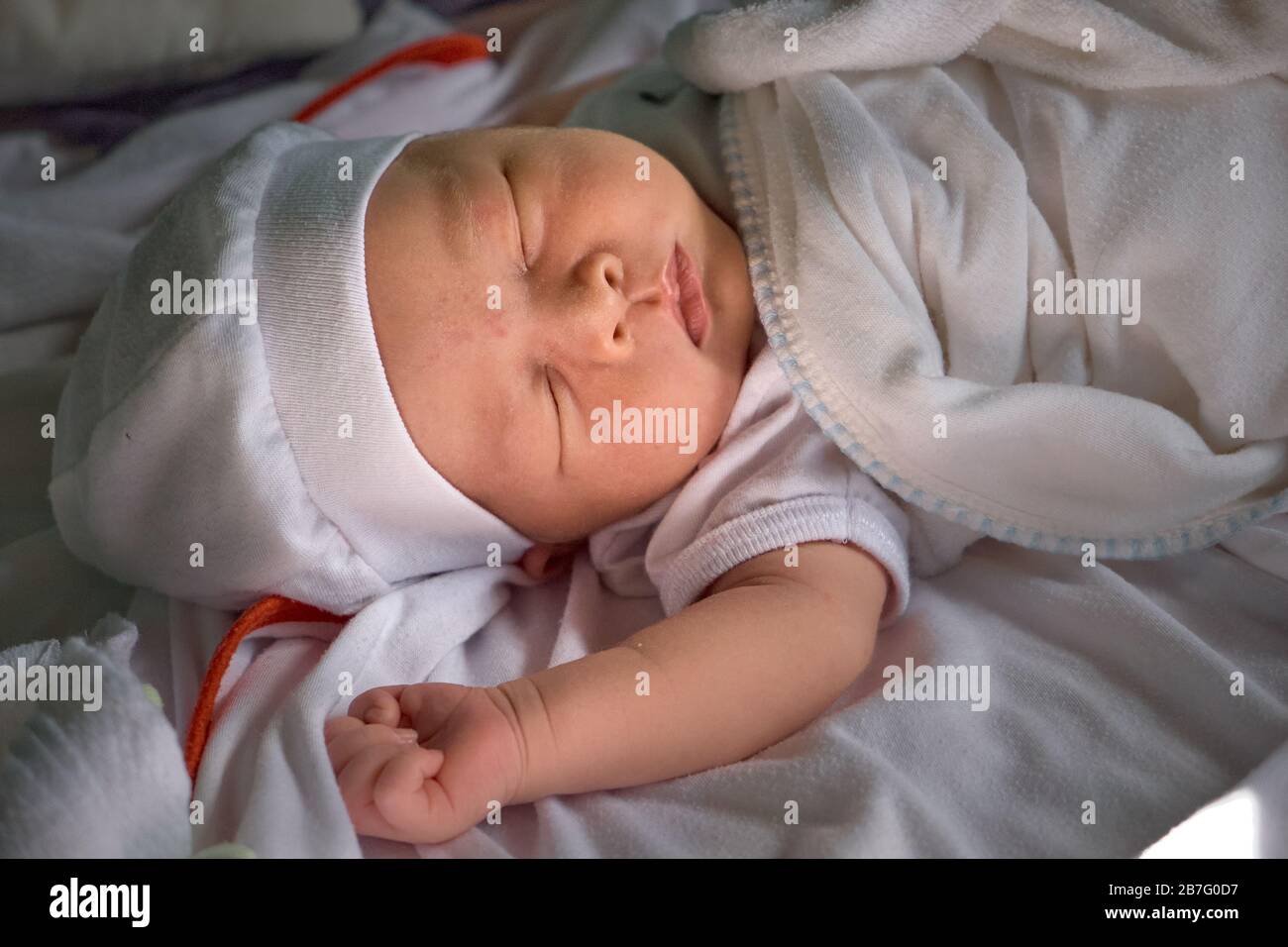 Infant boy at rest Stock Photo - Alamy