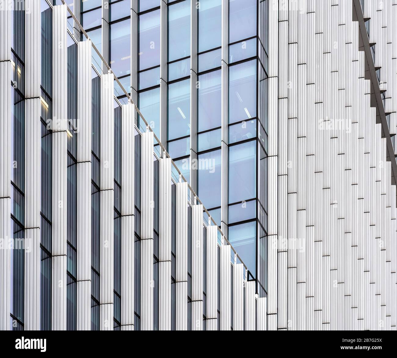 Modern skyscraper with many windows during daytime Stock Photo - Alamy
