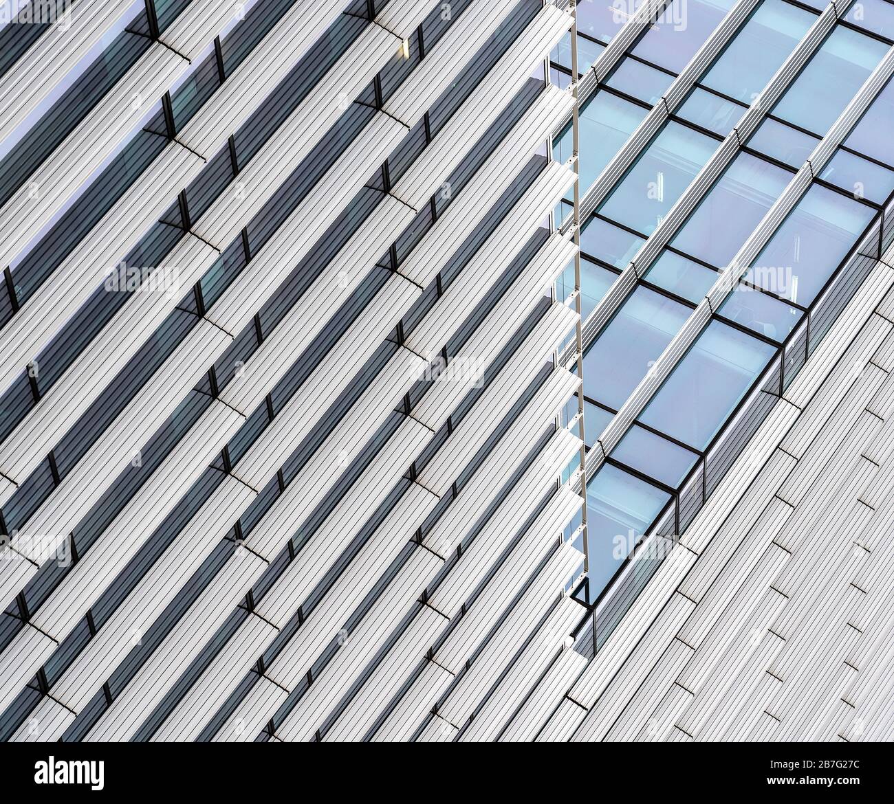 Modern skyscraper with many windows during daytime Stock Photo - Alamy