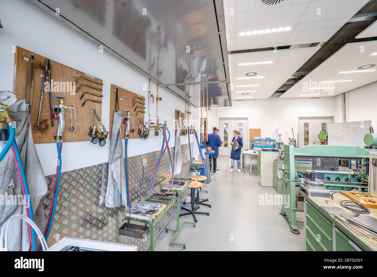 Uniforms manufacturing hi-res stock photography and images - Alamy