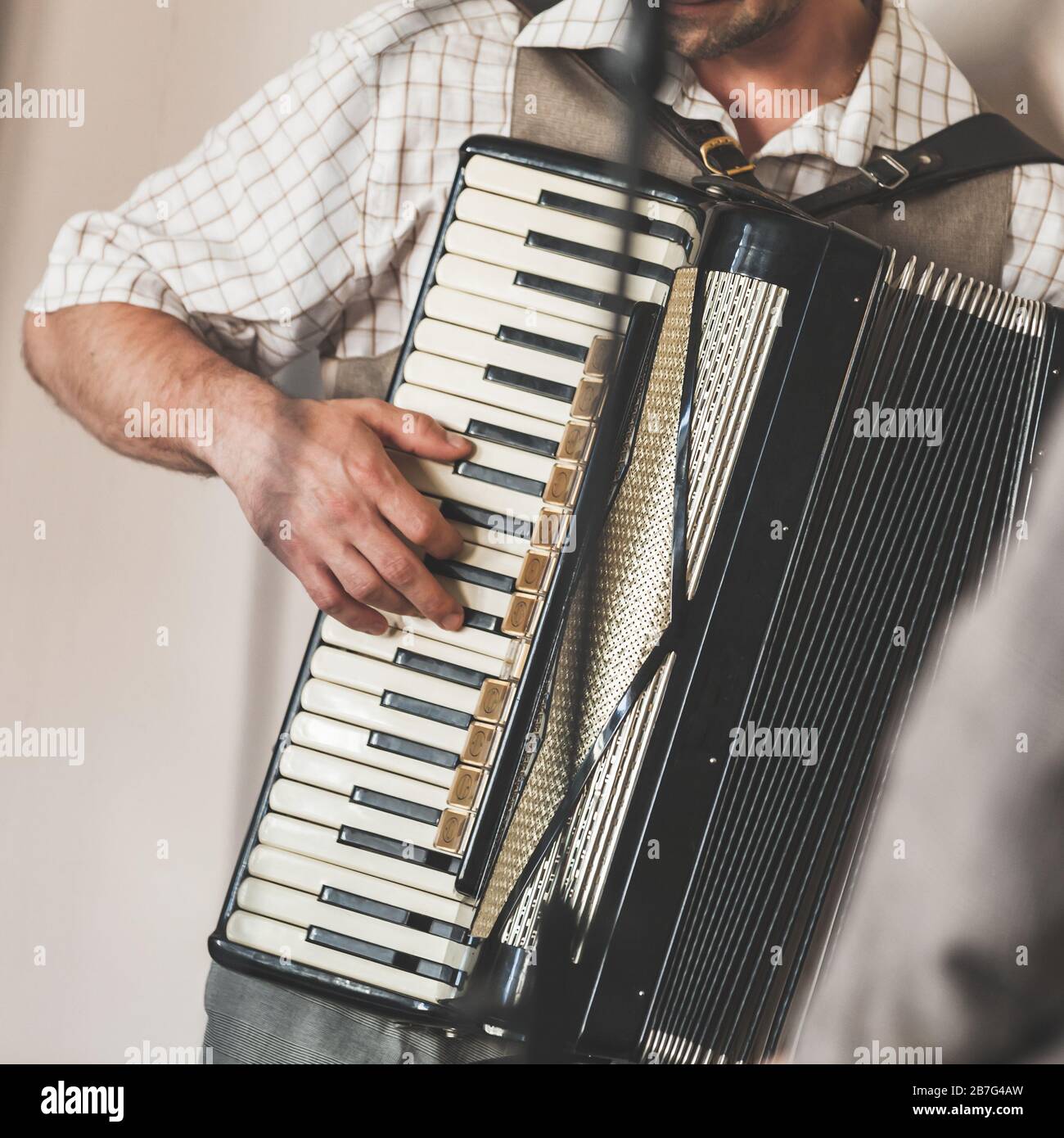 Live music background. Accordionist plays vintage accordion. Close-up ...