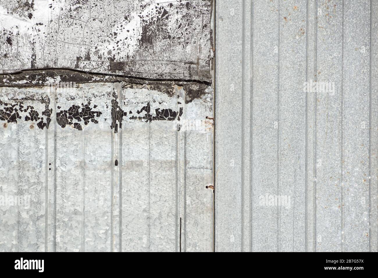 The broken cement wall and damaged until seeing the steel frame inside ...