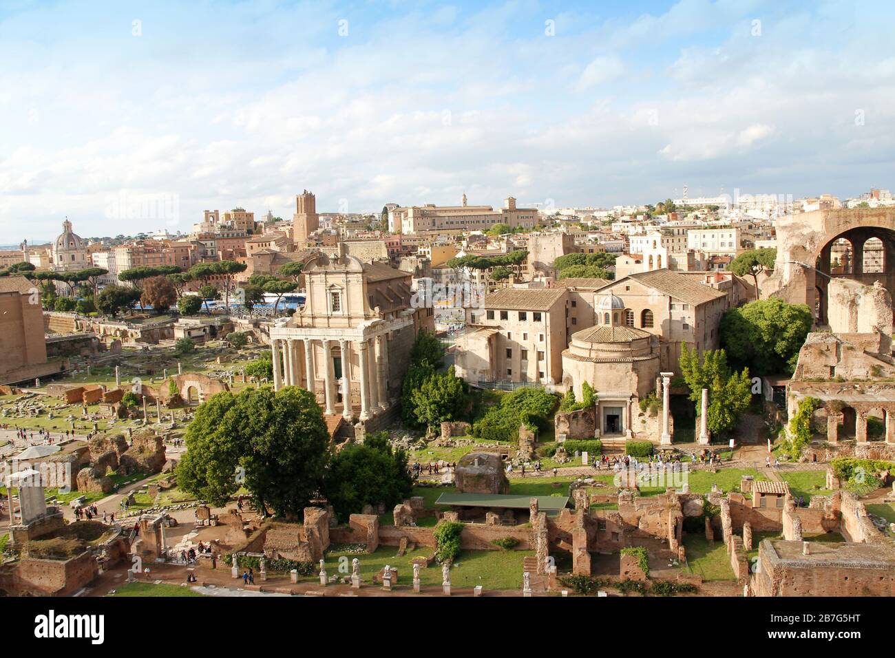 Aerial panoramic cityscape view of the Roman Forum during sunset in ...