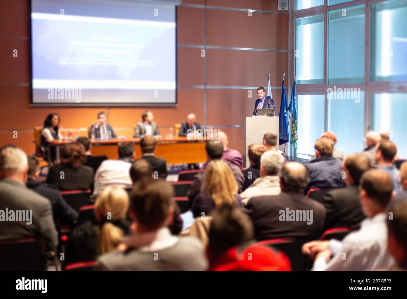 Speaker giving presentation on scientific business conference Stock ...