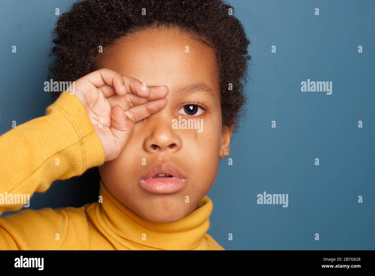 African boy crying hi-res stock photography and images - Alamy