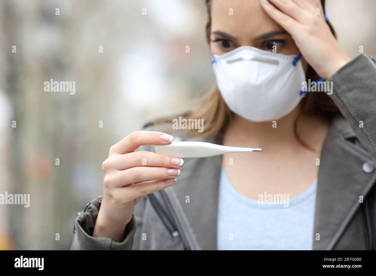 Teenager fever thermometer hi-res stock photography and images - Alamy