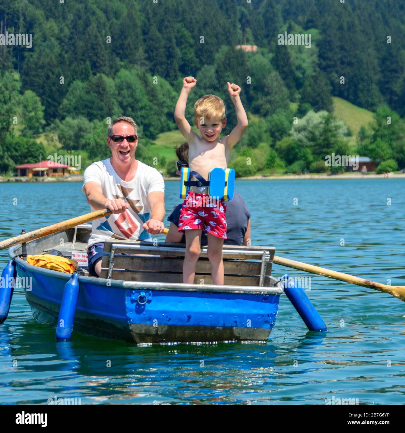 Child rowing a boat hi-res stock photography and images - Alamy