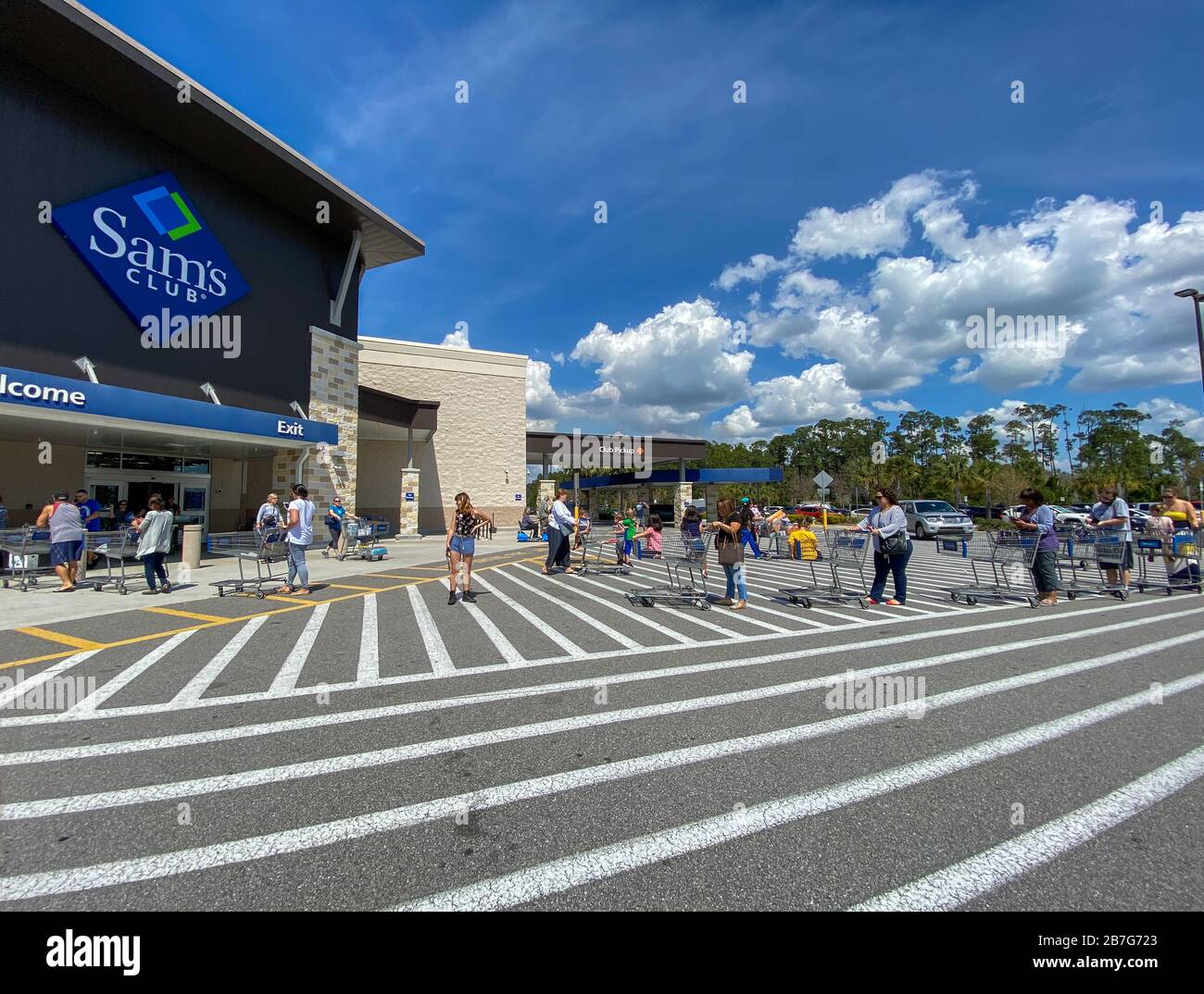 Orlando,FL/USA-3/14/20: Customers standing in long lines waiting to get ...