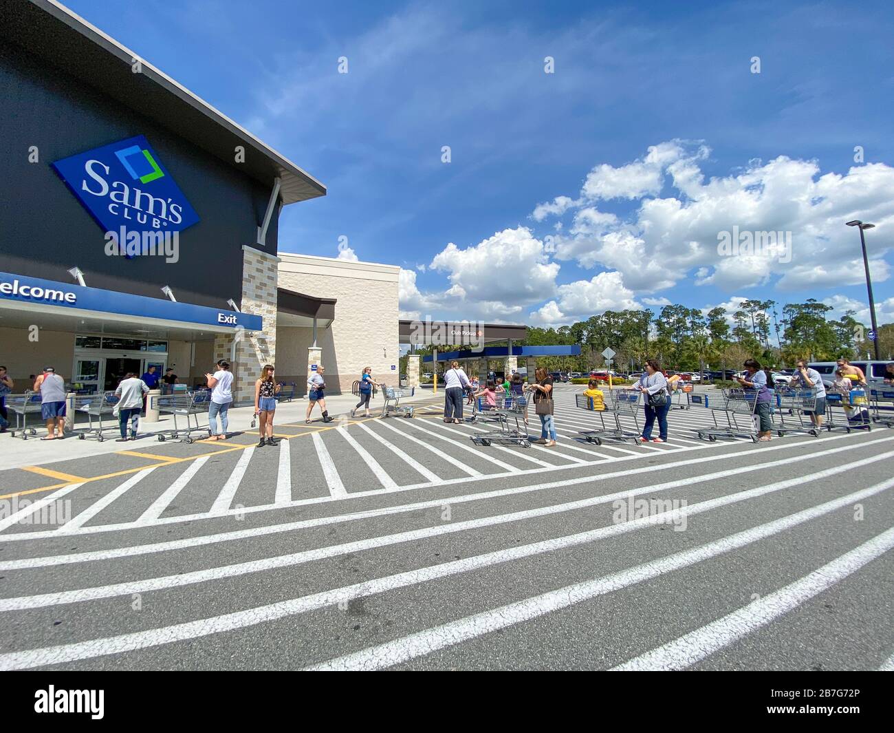 Orlando,FL/USA-3/14/20: Customers standing in long lines waiting to get ...