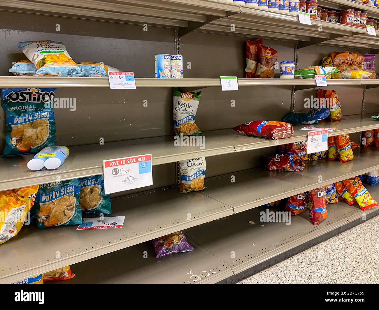 Orlando, FL/USA-3/14//20: Empty potato chip display shelves at a Publix ...