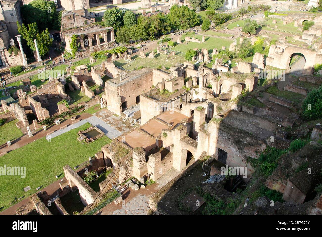 Aerial panoramic cityscape view of the Roman Forum during sunset in ...