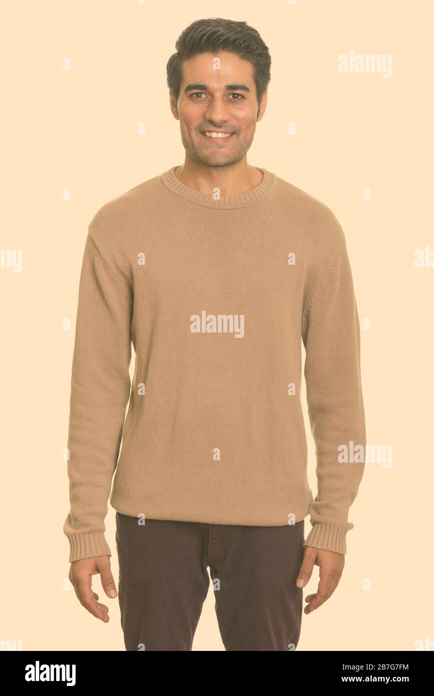 Portrait of happy handsome Persian man smiling Stock Photo - Alamy