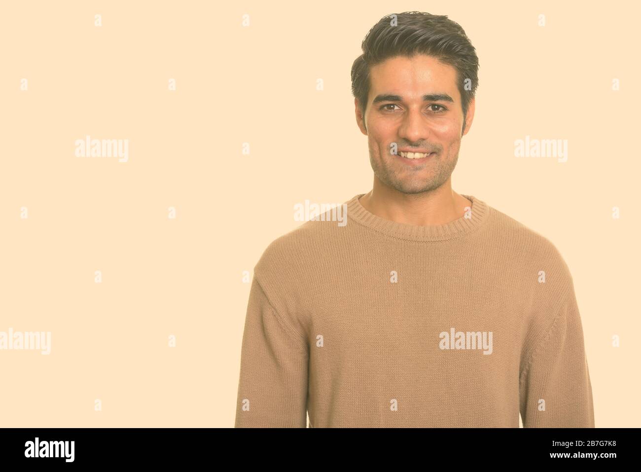 Portrait of happy handsome Persian man smiling Stock Photo - Alamy