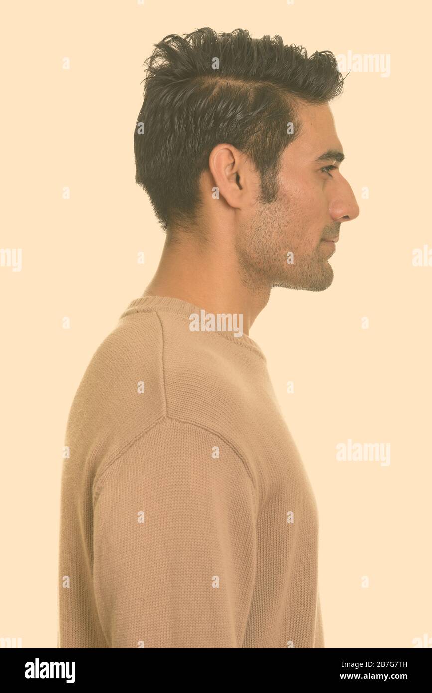 Profile view of young handsome Persian man Stock Photo - Alamy