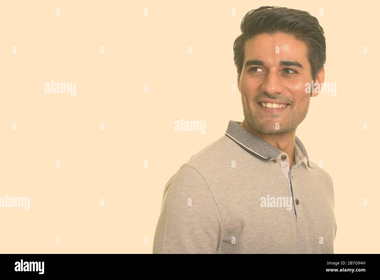 Thoughtful happy persian man hi-res stock photography and images - Alamy