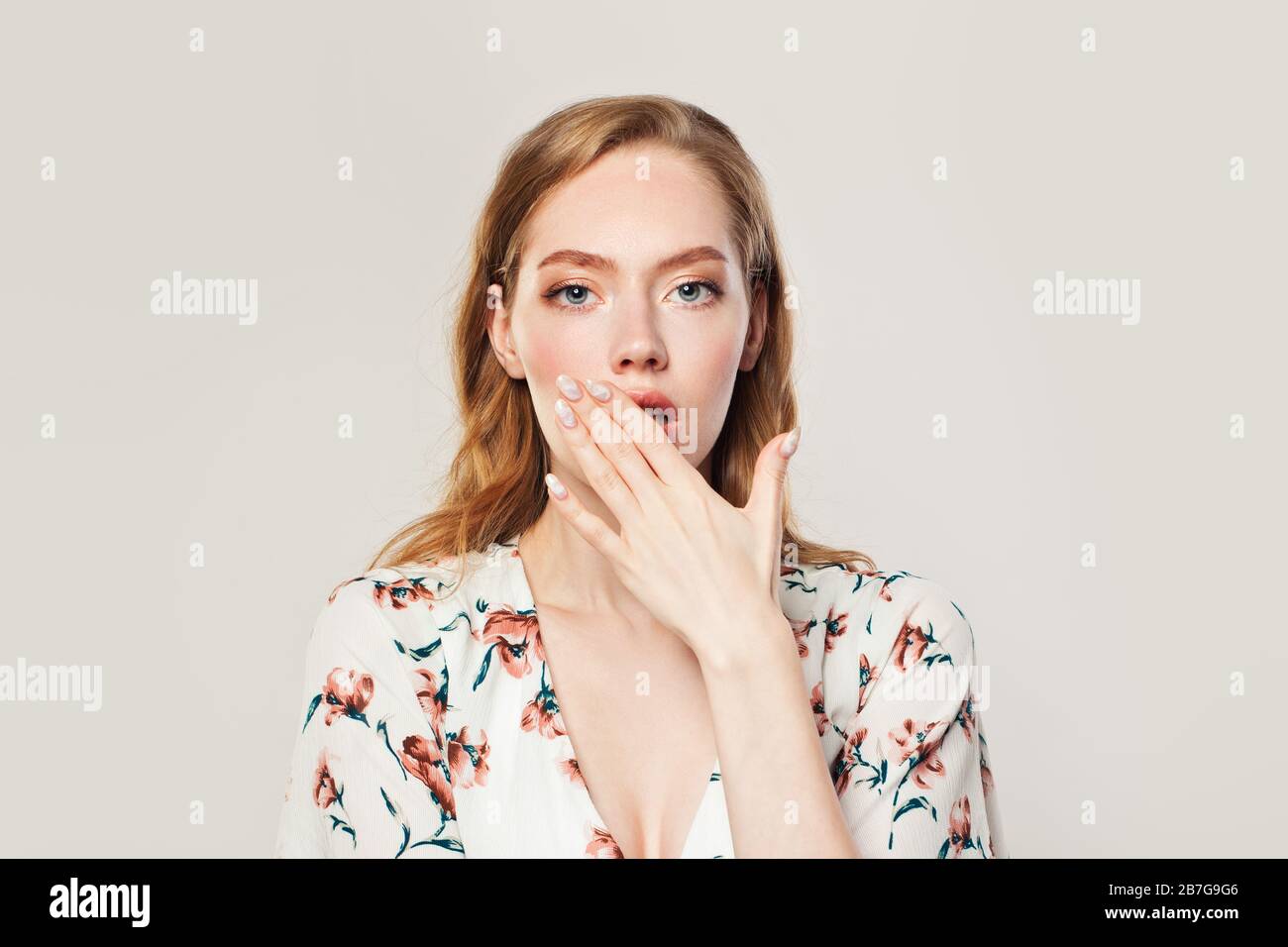 Shocked surprised woman face close up on white background Stock Photo ...