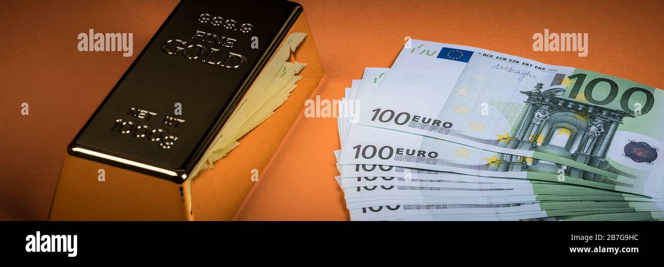Euro cash and gold bar on a orange background. Banknotes. Money. Bill ...