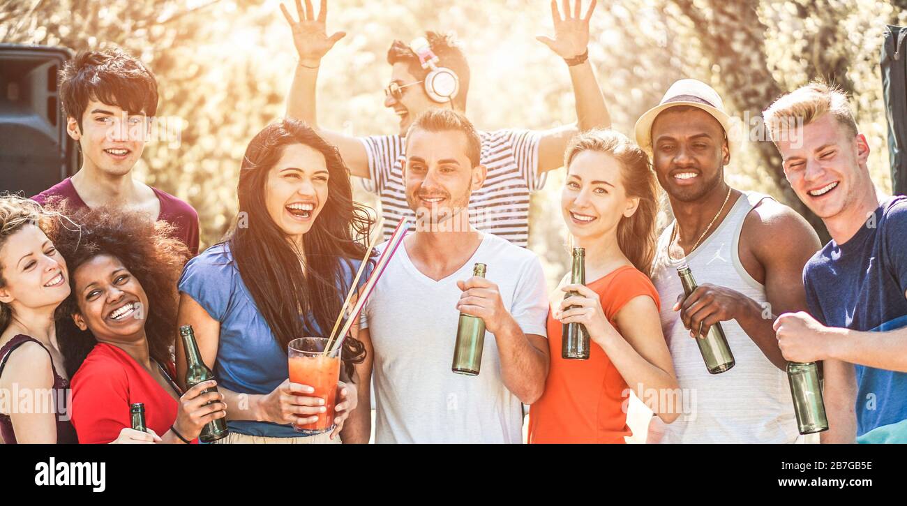 Happy friends from different countries at summer party outdoor - Young ...