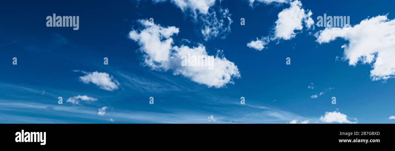 Bright blue sky with clouds, nature and environmental background Stock ...
