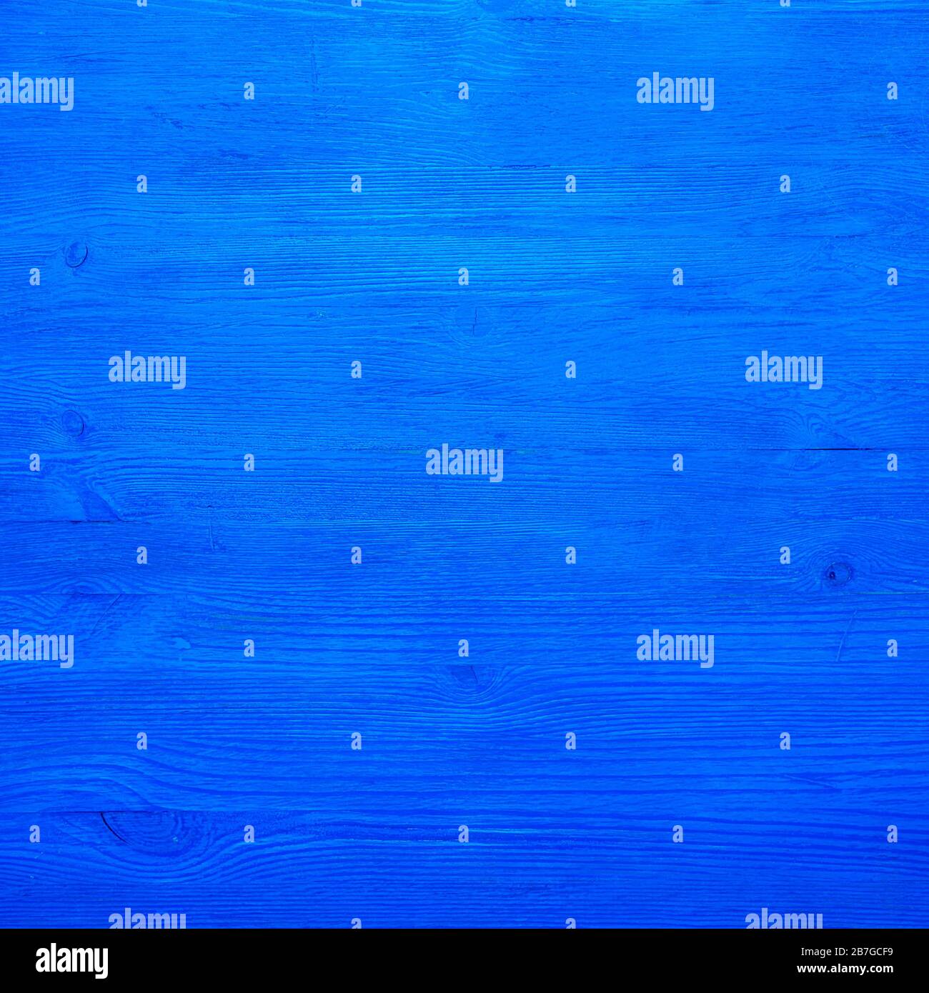 The background is wooden boards, blue saturated color Stock Photo - Alamy
